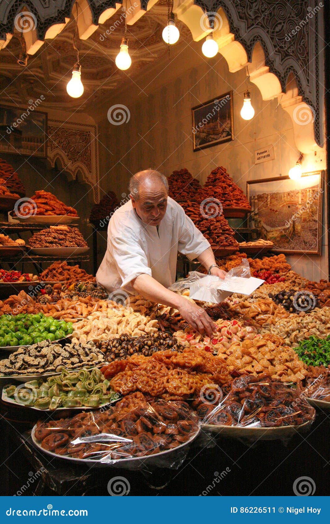 Sweet seller in Marrakesh editorial photo. Image of africa - 86226511