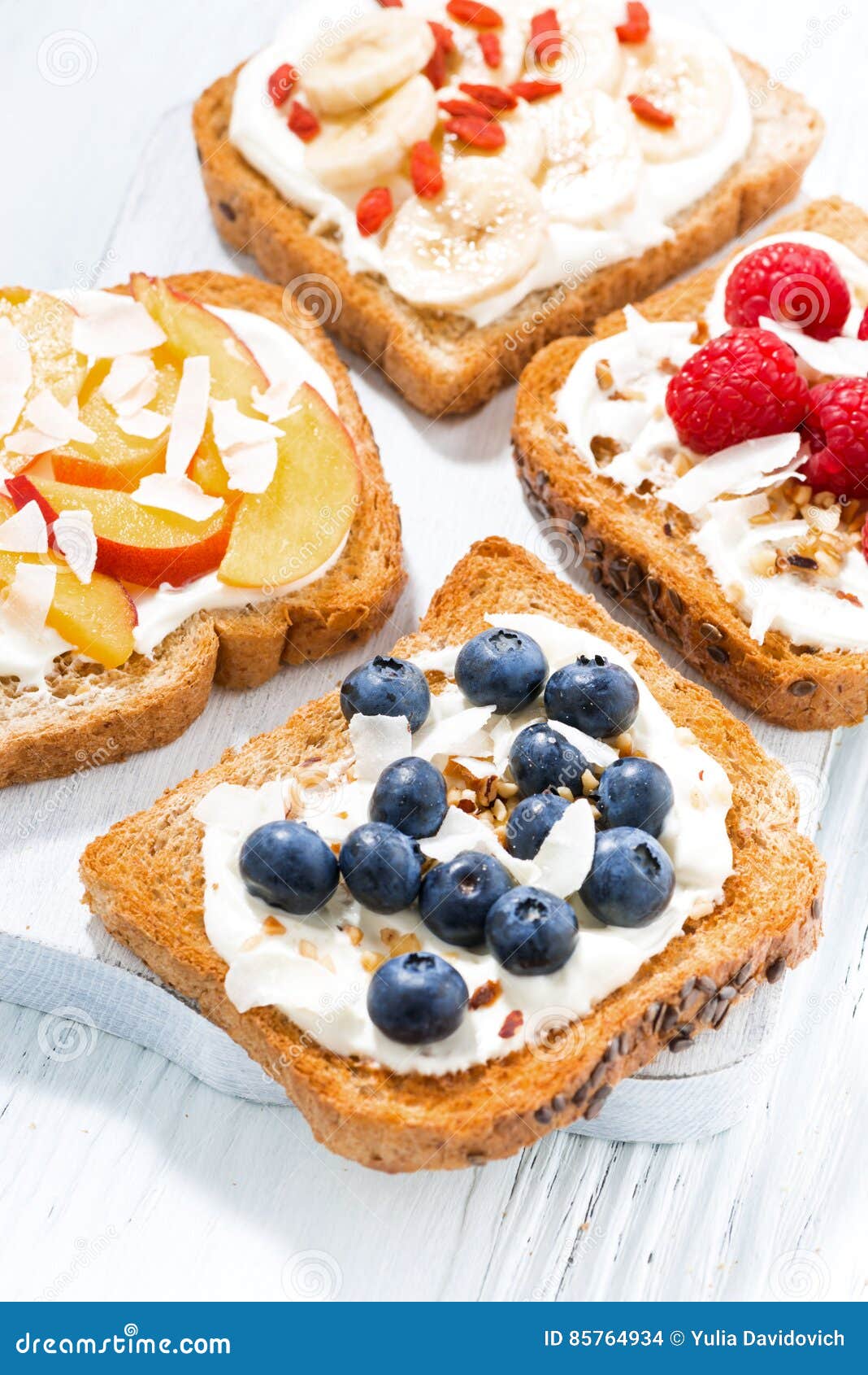 Sweet Toast with Different Toppings, Vertical Top View Stock Photo ...