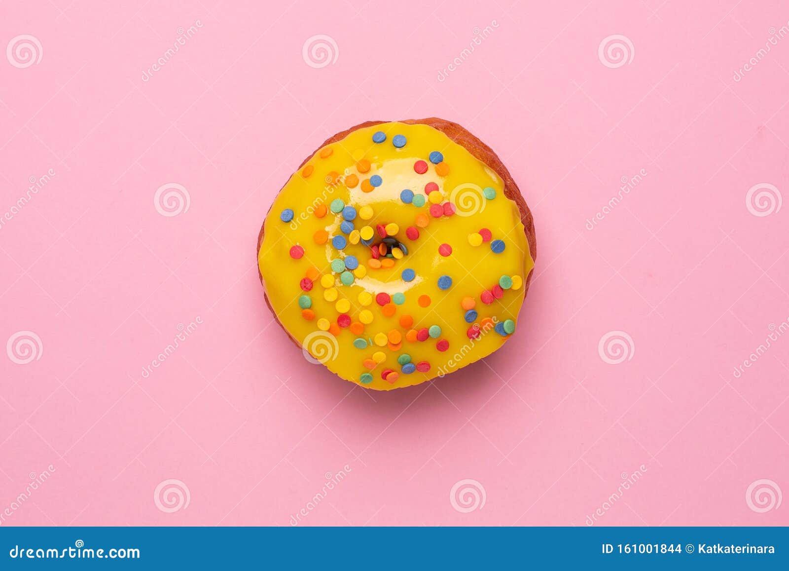 Sweet Yellow Donut with Sprinkle on a Pink Background Flat Lay Stock ...
