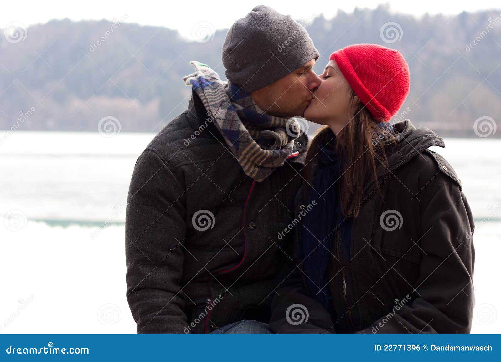 A Sweet Young Couple Kissing Stock Photo - Image of couple, male: 22771396