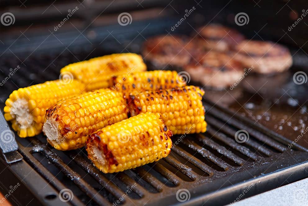 Sweetcorn Cooking on a Barbecue Stock Image - Image of people, colour ...