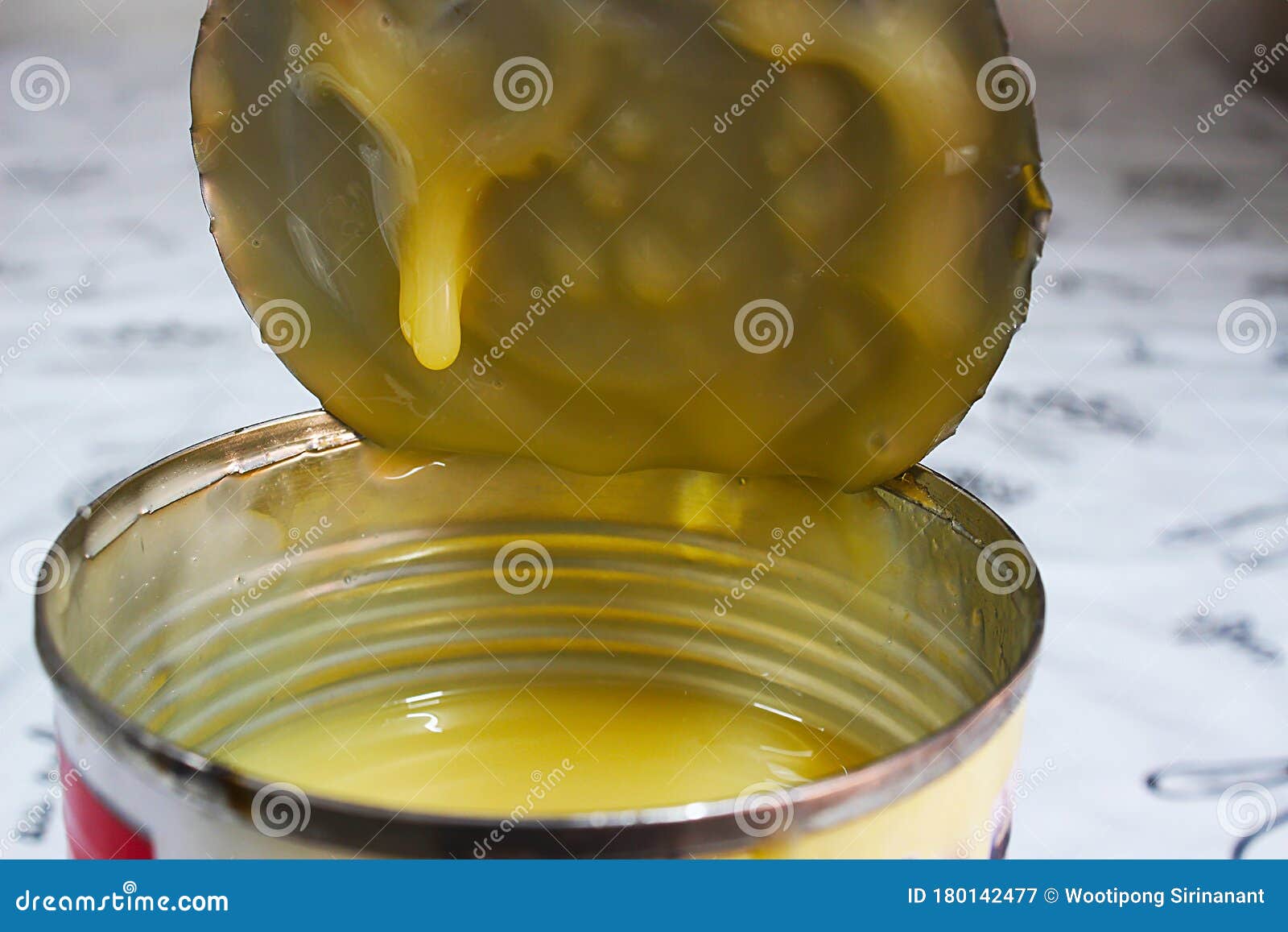 Sweetened Condensed Milk on the Lid of the Can Stock Image - Image of ...