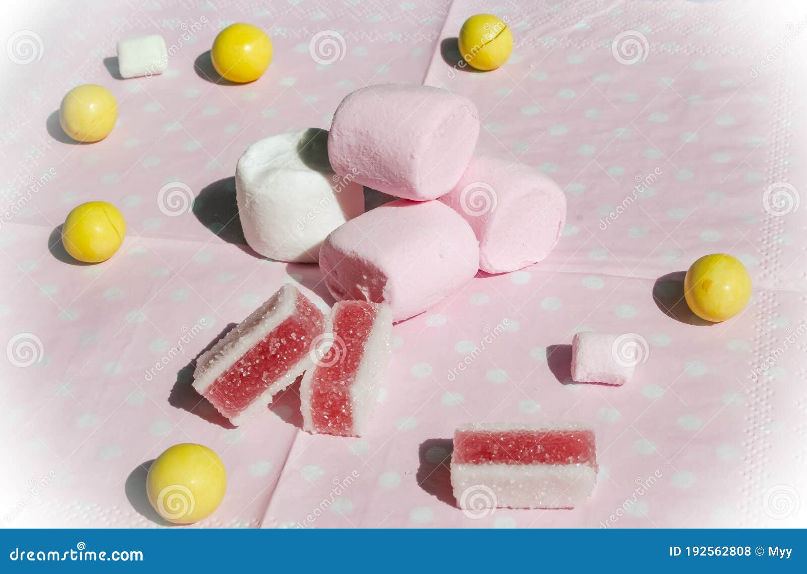 Sweeties on a pink surface stock photo. Image of petal - 192562808