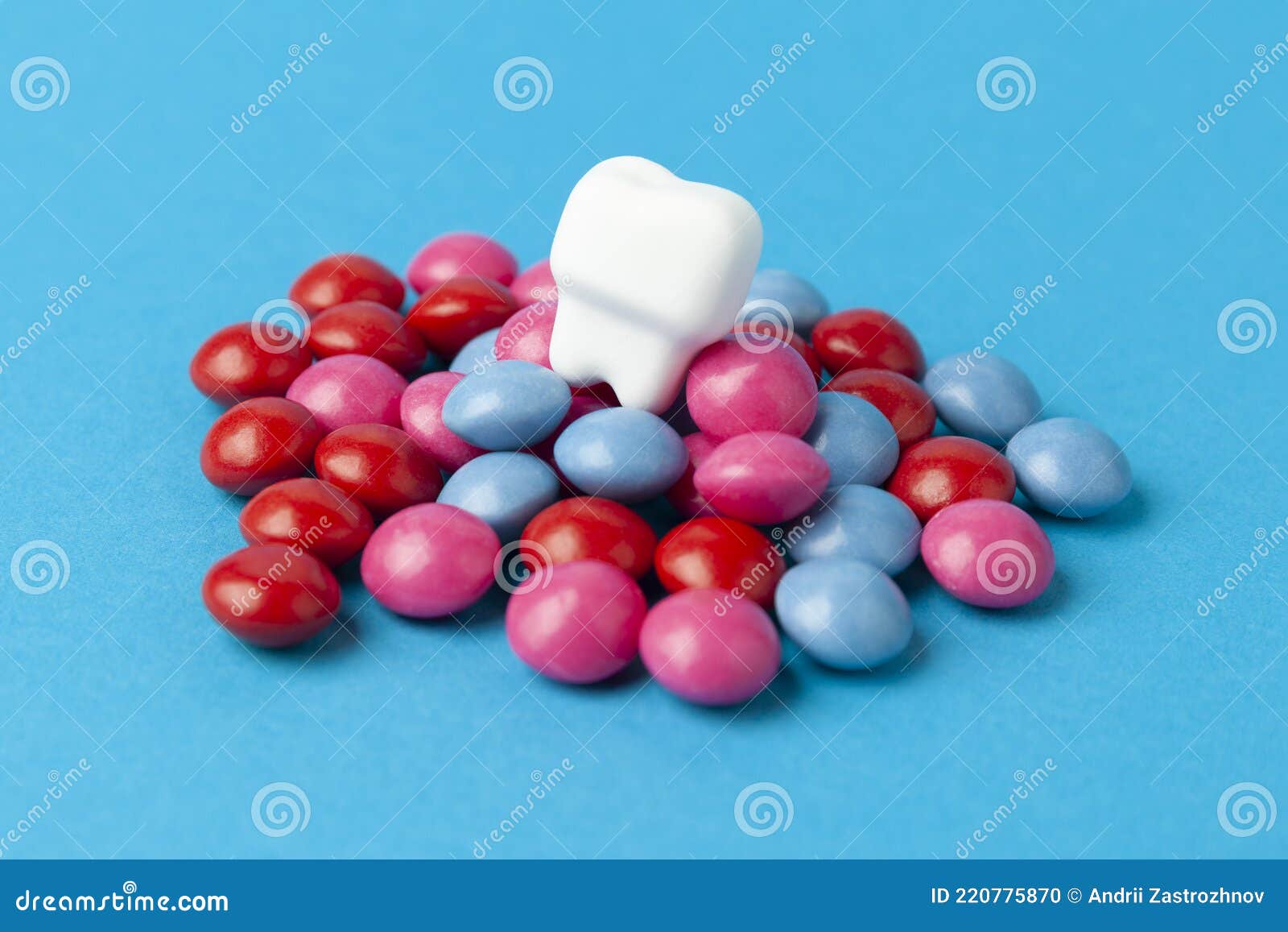 Sweets Cause Tooth Decay. Teeth on a Pile of Candies Stock Photo ...