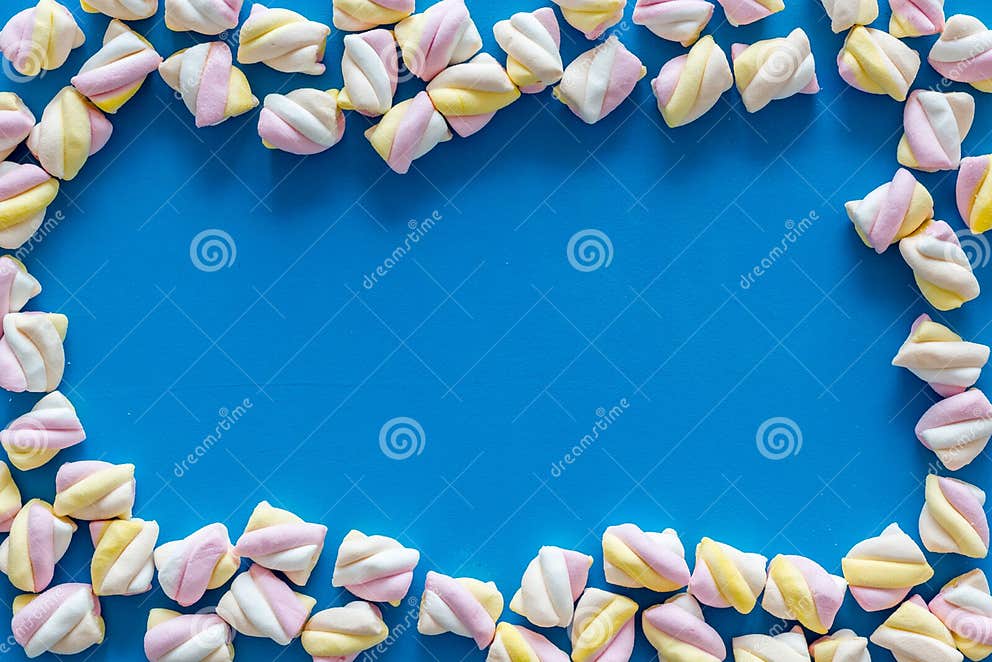 Sweets. Marshmallows Frame on Blue Background Top View Space for Text ...