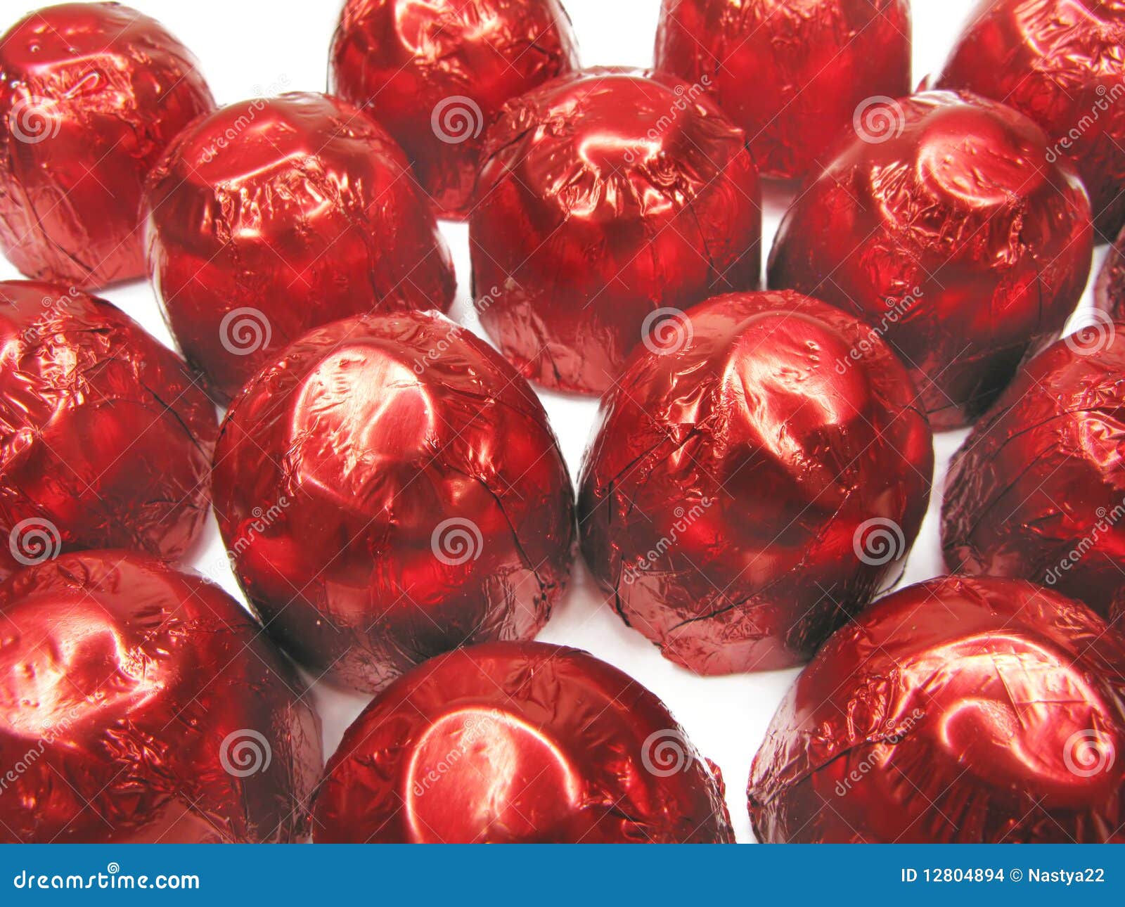 Sweets in red envelopment stock photo. Image of sweet - 12804894