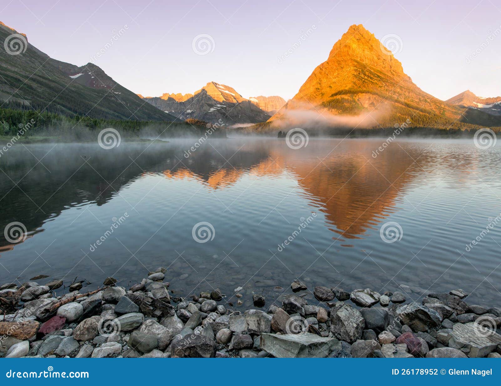 Swiftcurrent Lake stock photo. Image of united, sunset - 26178952