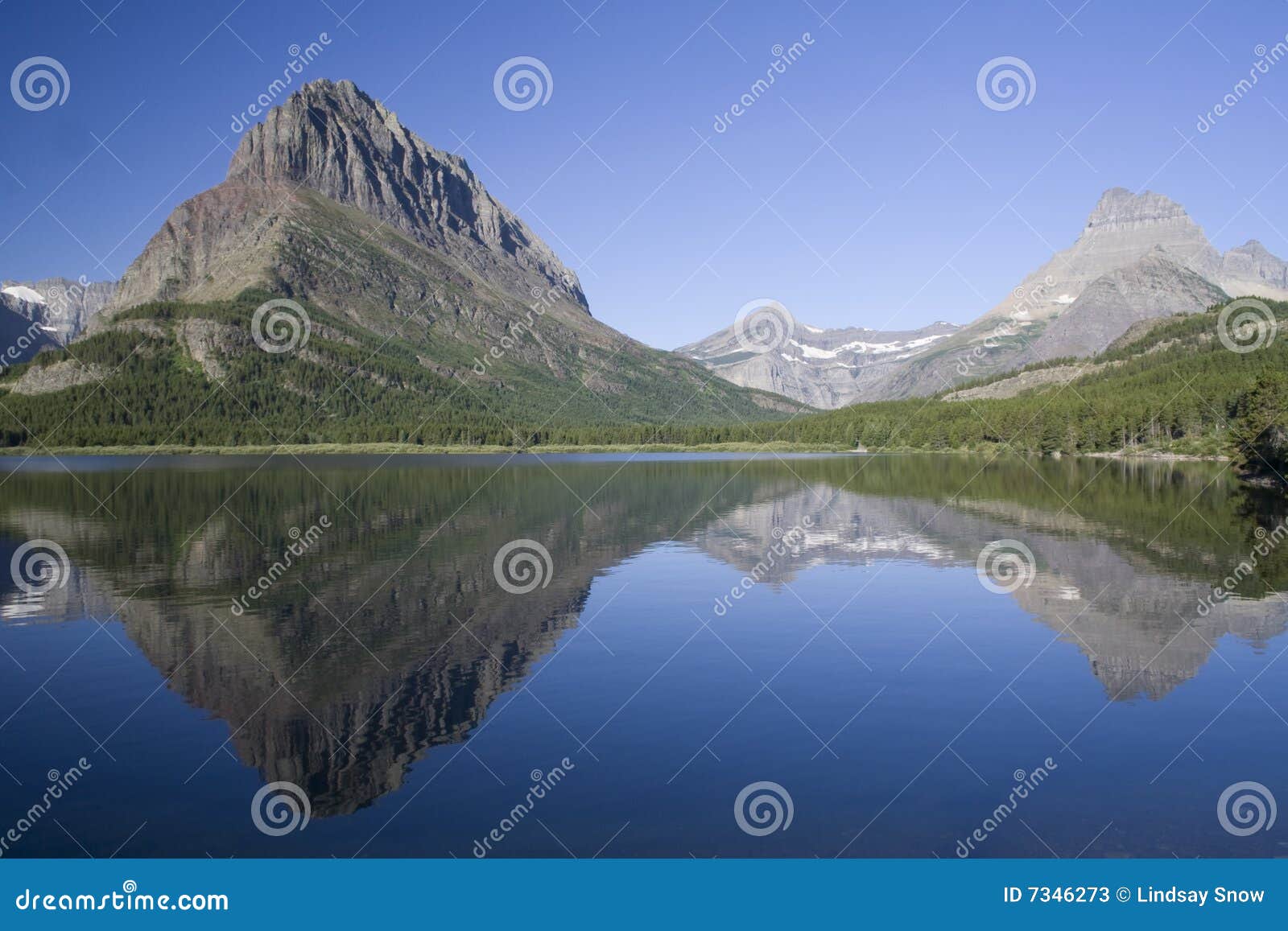Swiftcurrent Lake stock image. Image of swiftcurrent, peak - 7346273