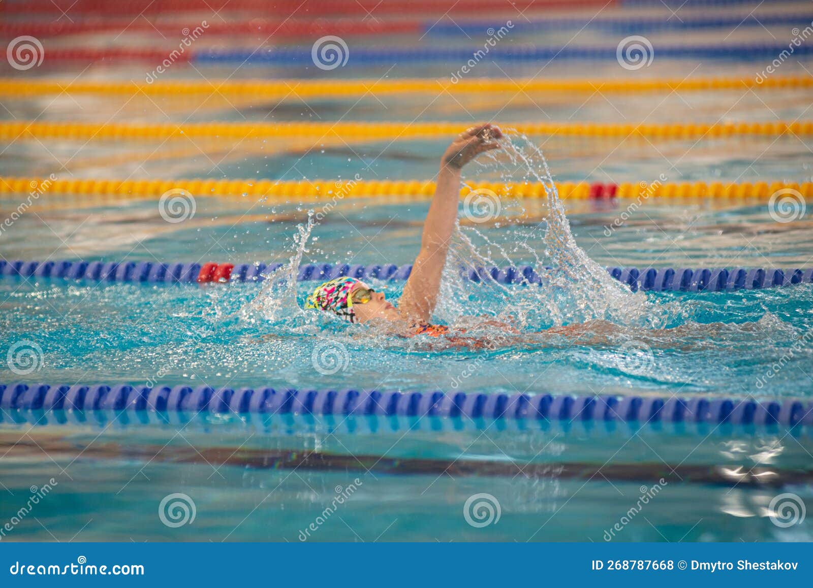 Swimmer Child Swims Backstroke Swimming Style in the Pool Stock Photo ...
