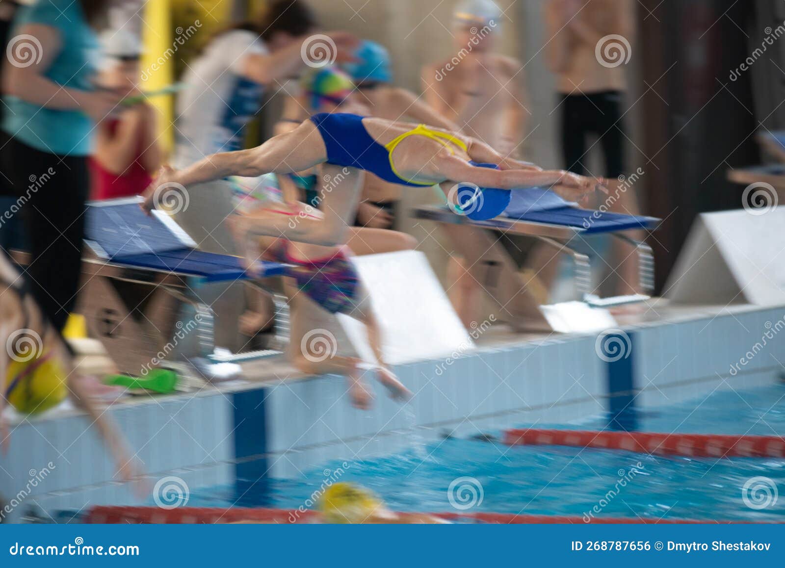 Swimmer Girl Start from the Starting Table in the Pool Stock Photo ...