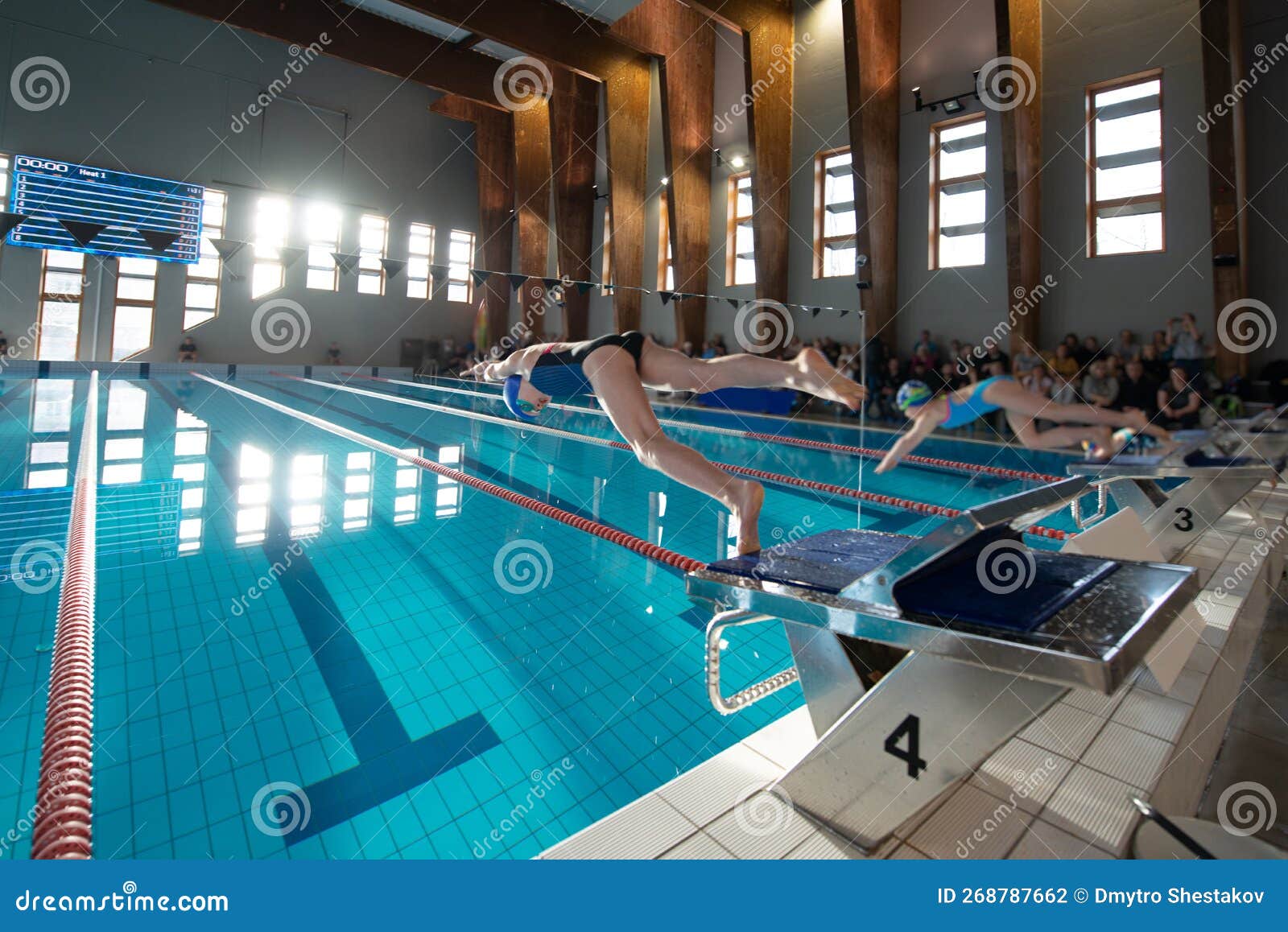 Swimmer Girl Start from the Starting Table in the Pool Stock Photo ...