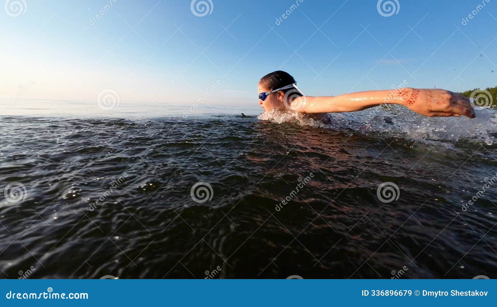 Swimmer Girl Swims Butterfly Swimming Style in the Sea Stock Image ... Swimmer Girl Swims Butterfly Swimming Style in the Sea Stock Image ...
