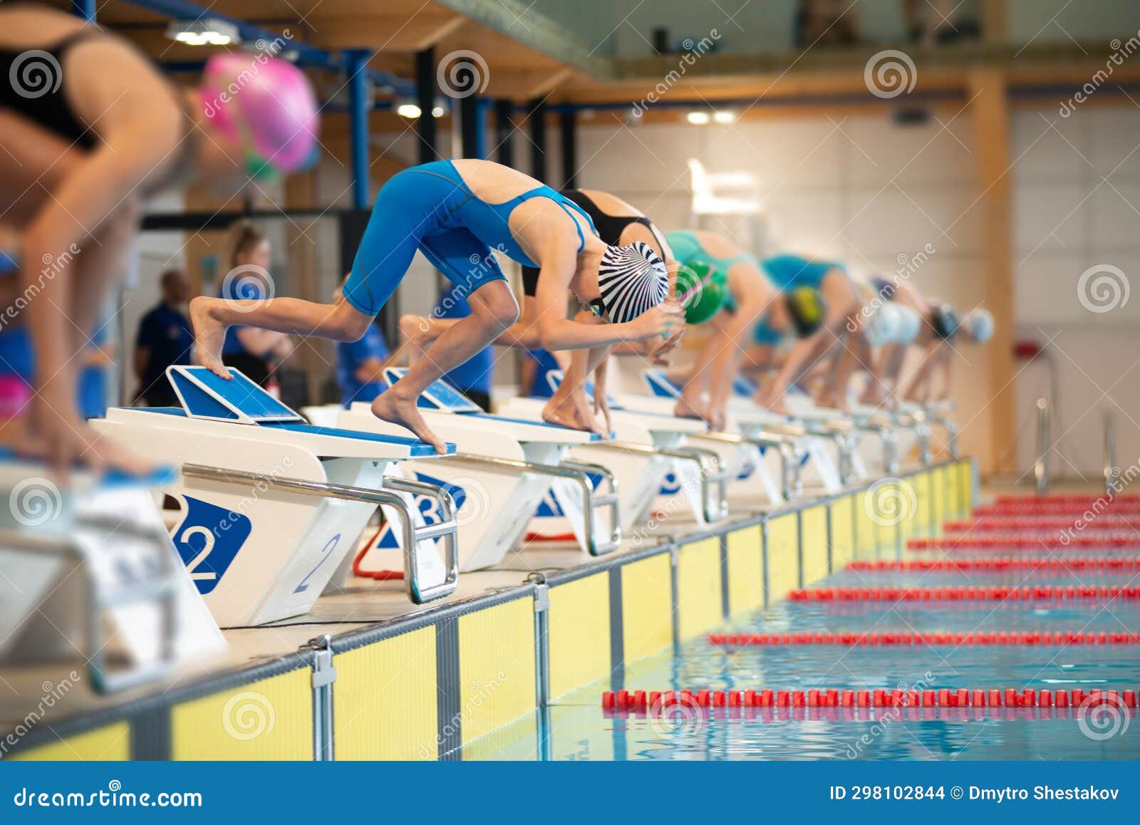 Swimmer Girls Start from the Starting Table in the Pool Stock Photo ...
