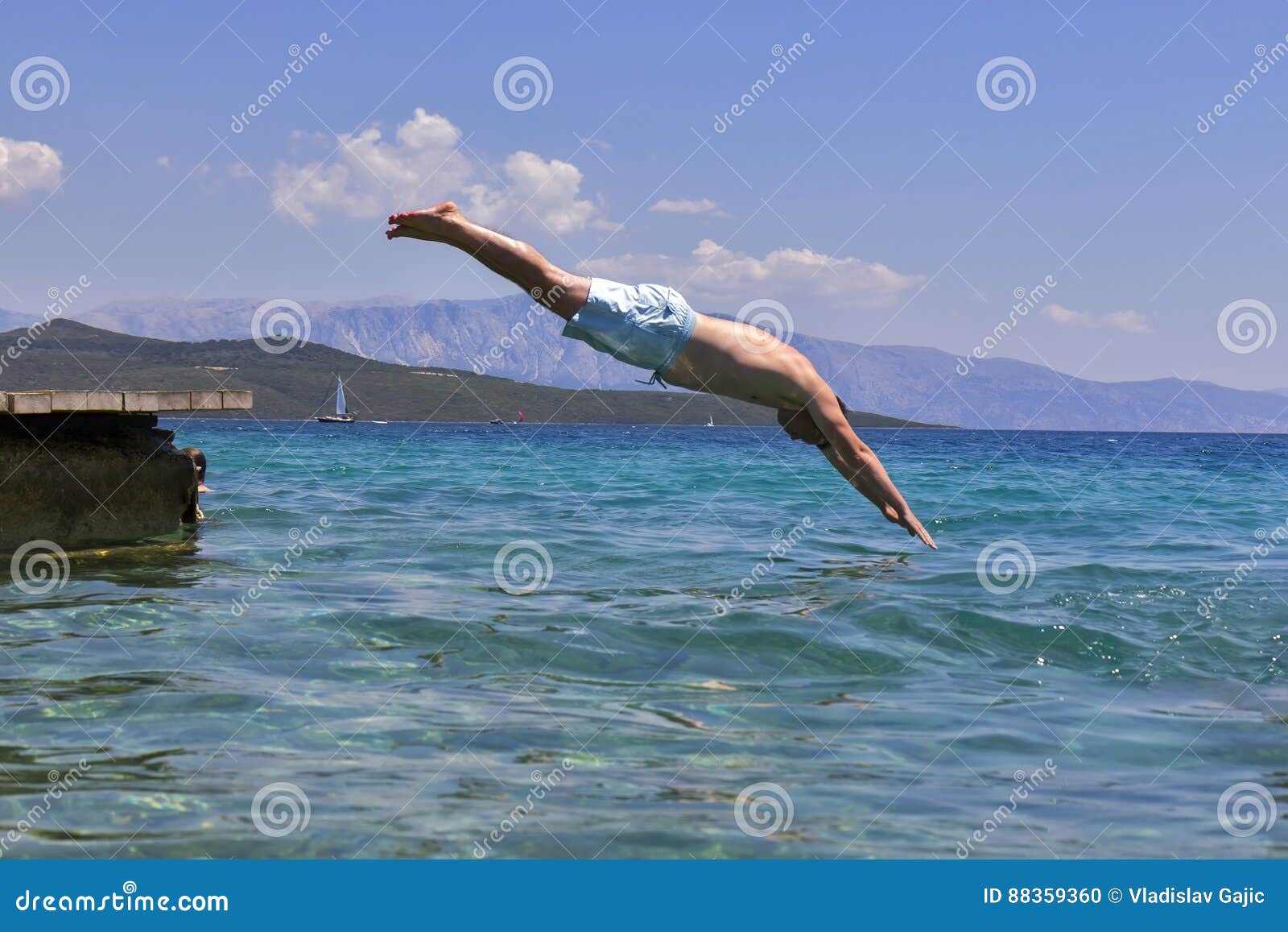 Swimmer Jumping To Sea Water Stock Photo - Image of active, diving ...