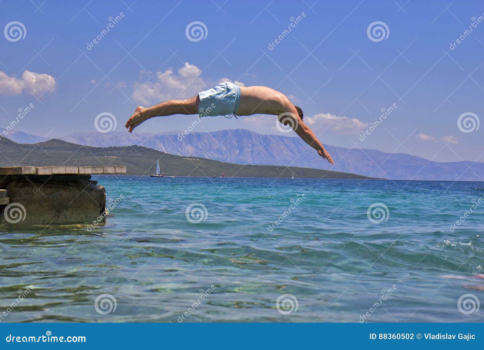 Swimmer Jumping To Sea Water Stock Photo - Image of body, outdoor: 88360502