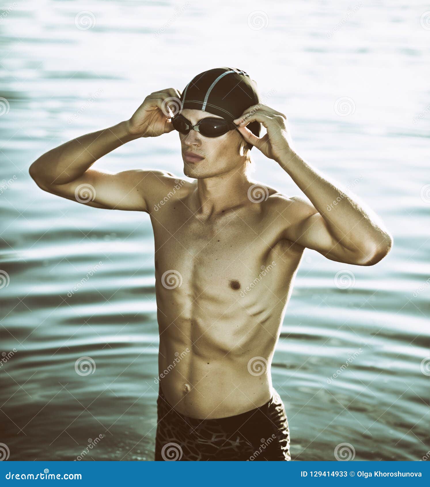 Swimmer model in a sea stock image. Image of fashion - 129414933