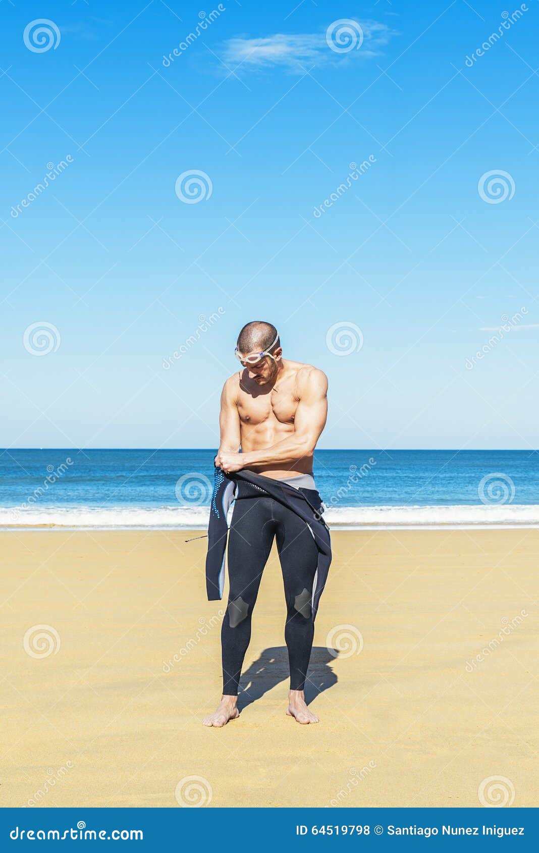 Swimmer Putting on His Wetsuit. Stock Photo - Image of portrait ...