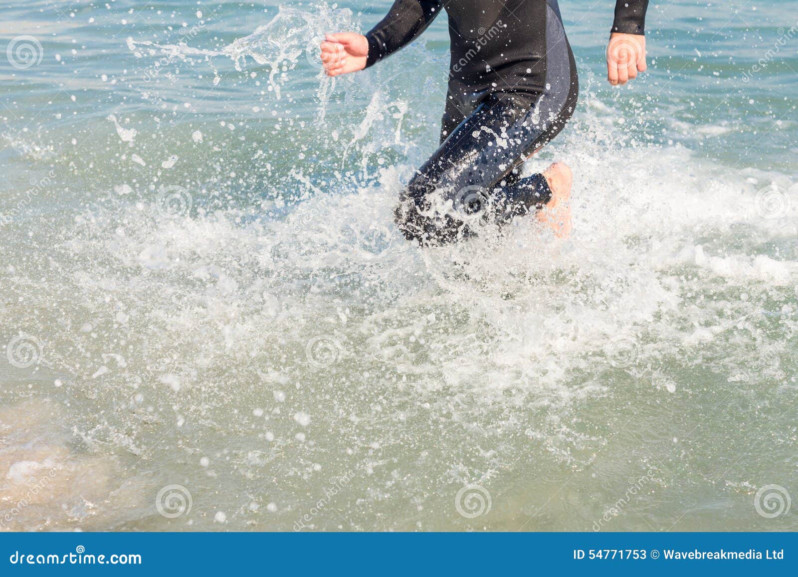 Swimmer Running in the Ocean Stock Image - Image of athletic, outdoors ...