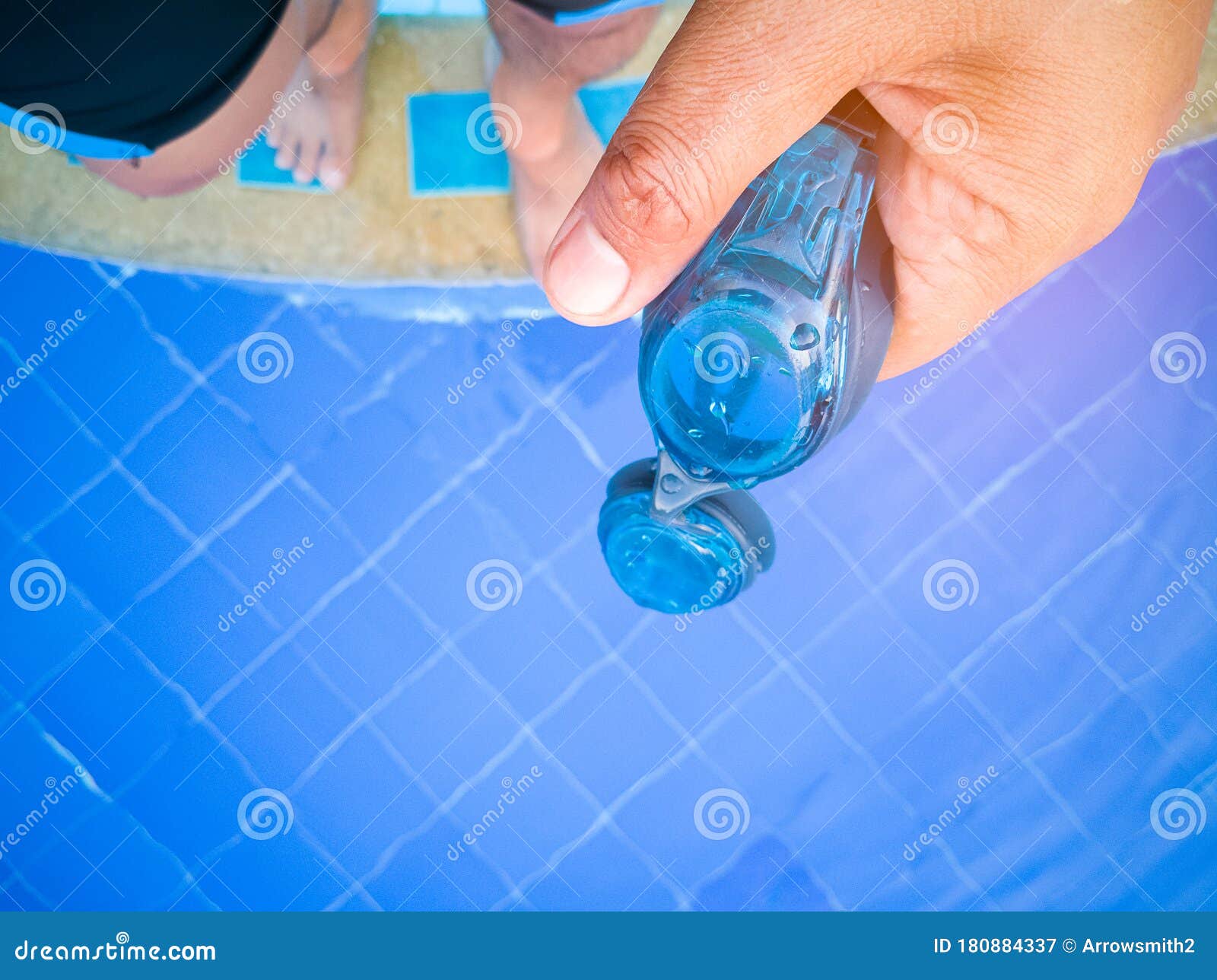 Swimmer `s Hand Holds the Swimming Goggles on the Pool Edge Stock Image ...