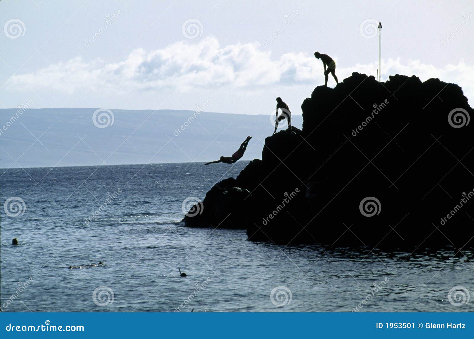Swimmers Diving from a Rock Stock Image - Image of divers, rocky: 1953501