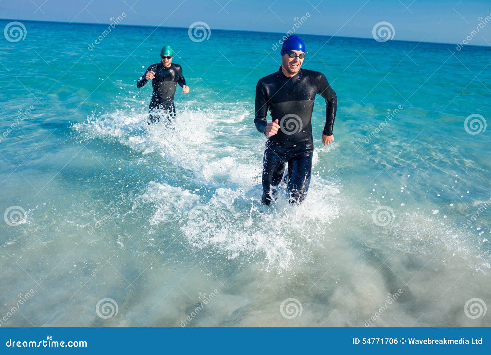 Swimmers Running in the Ocean Stock Photo - Image of happy, healthy ...