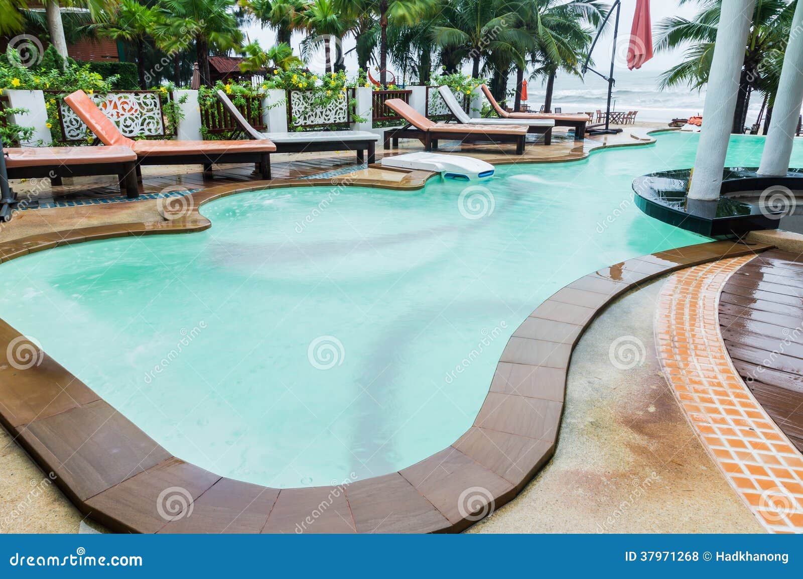 Swimmimg pool in rain stock photo. Image of garden, swimming - 37971268