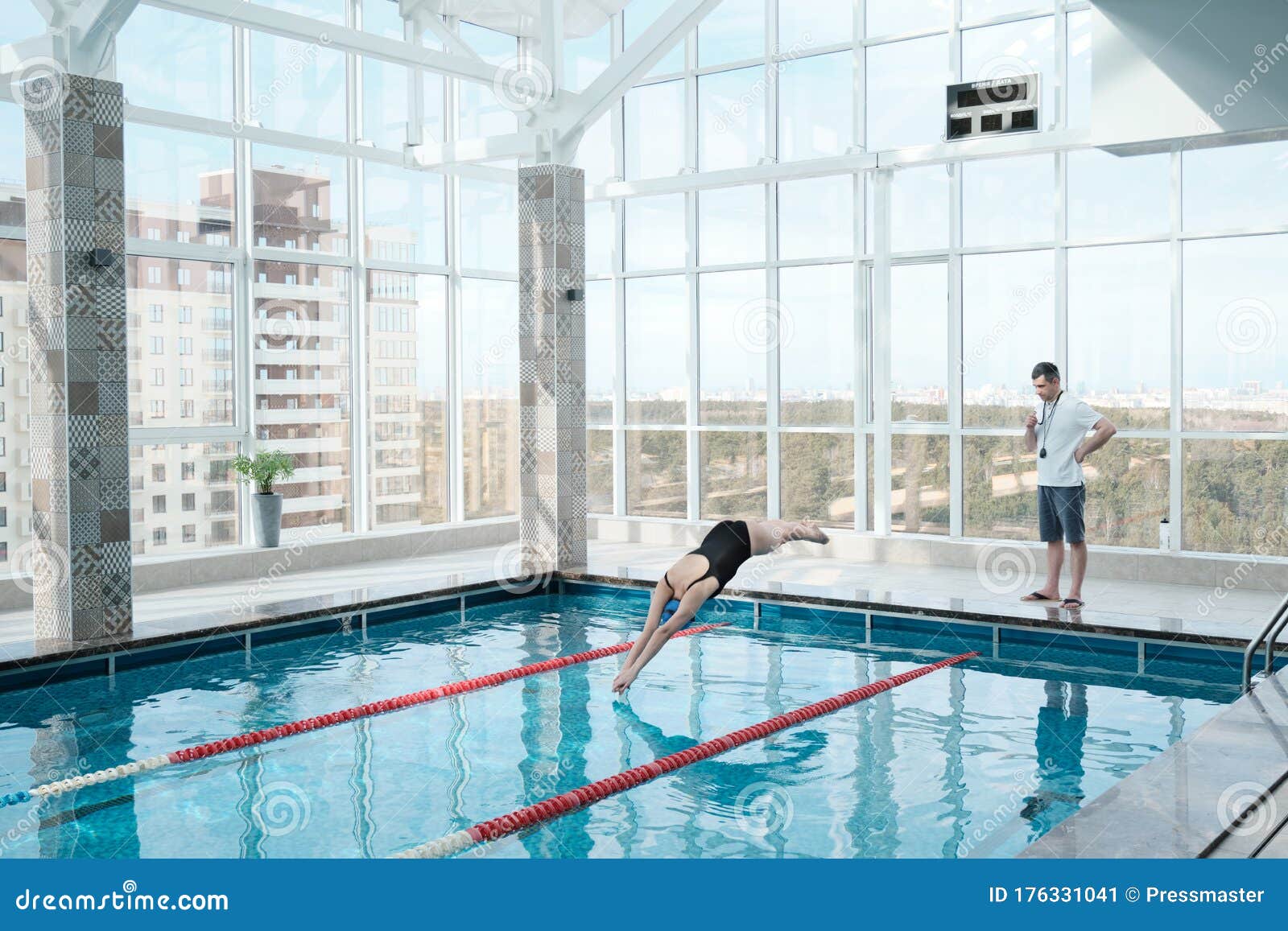Swimming Coach Watching Swimmer Stock Image Image Of Lifestyles