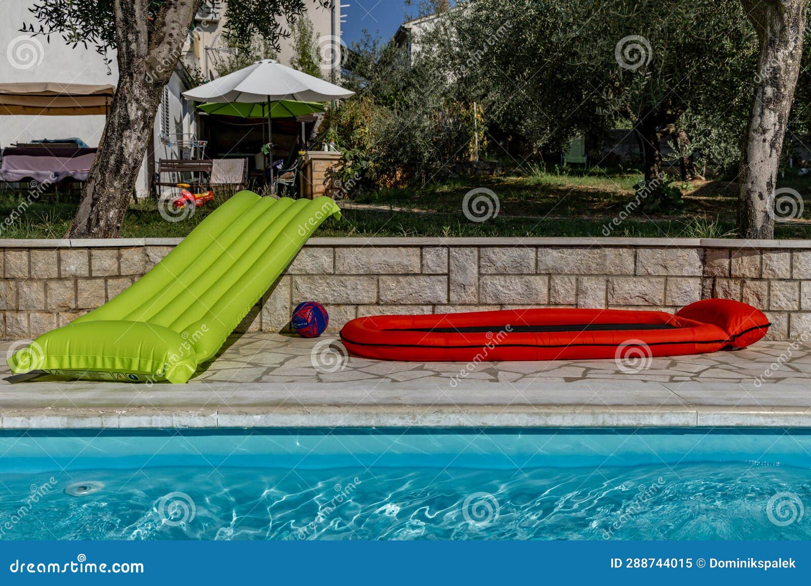 Swimming on a Mattress Inflatable Mattress in the Pool Taking Up Space ...