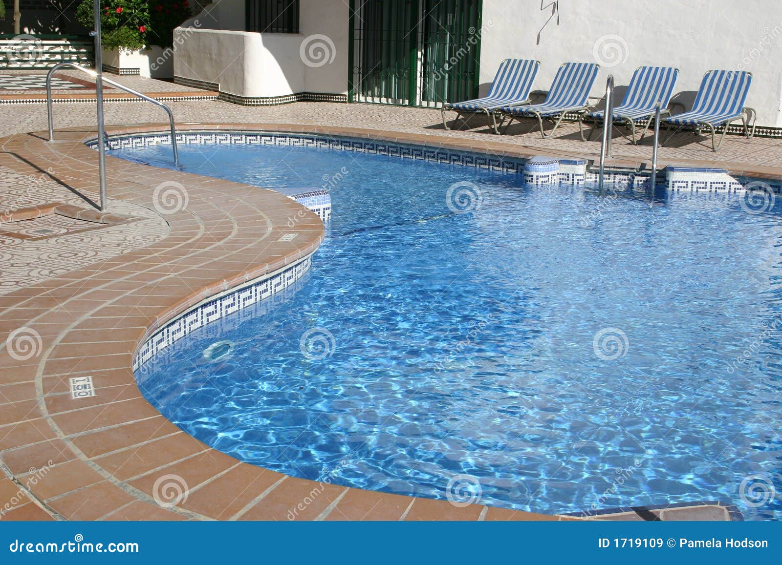 Swimming pool stock image. Image of sunlounges, shaped - 1719109