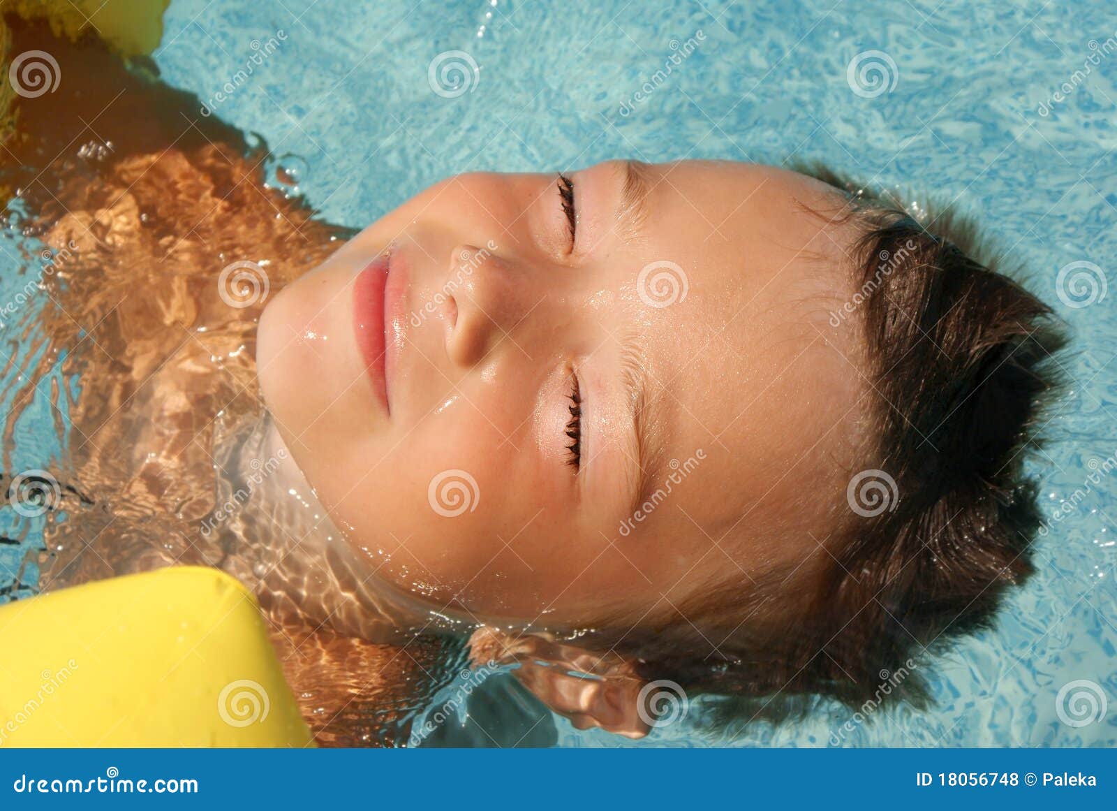 In swimming pool stock photo. Image of playing, lying - 18056748