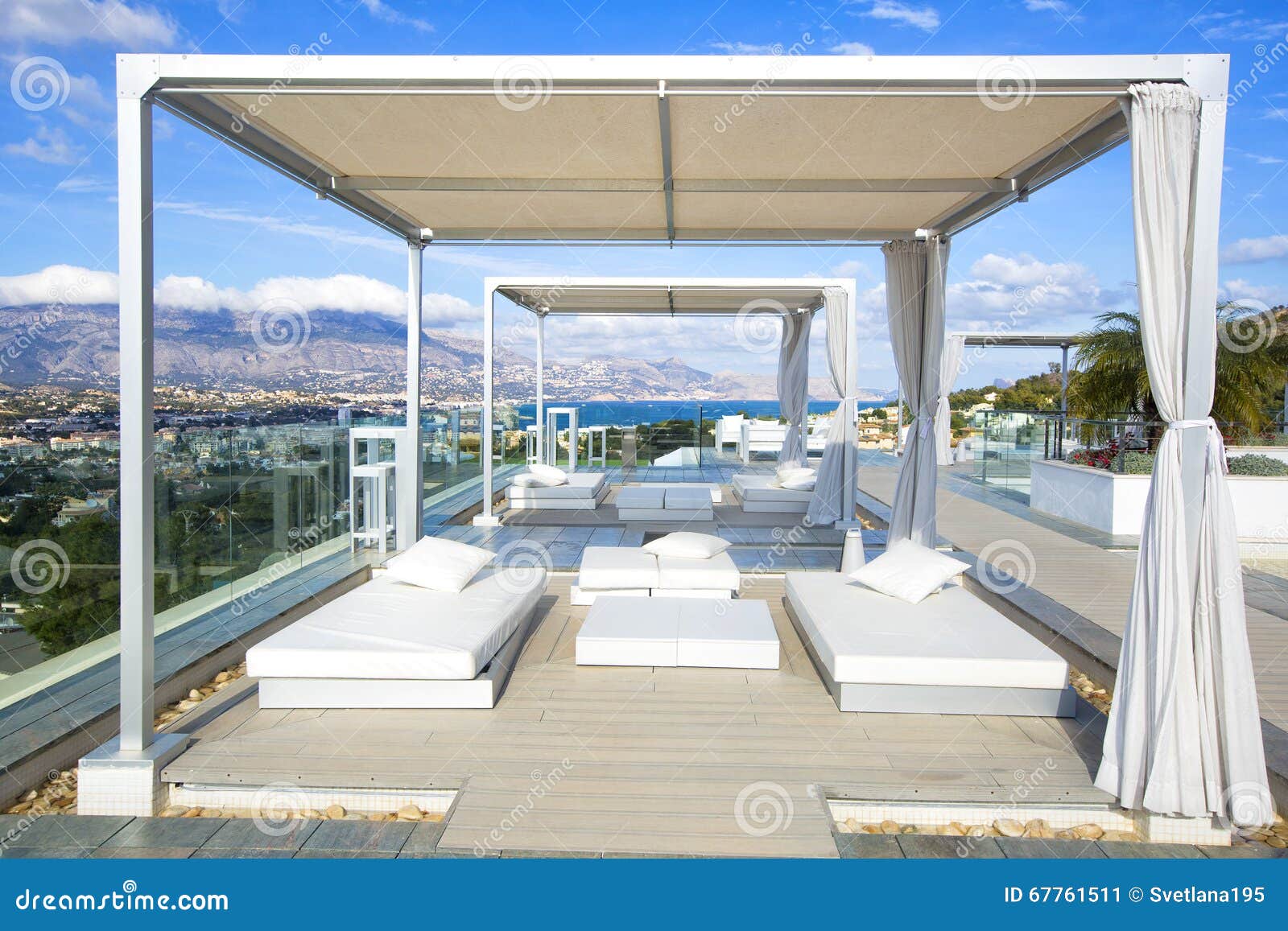 Swimming Pool Area with White Sun Beds at the Modern Resort. Stock ...