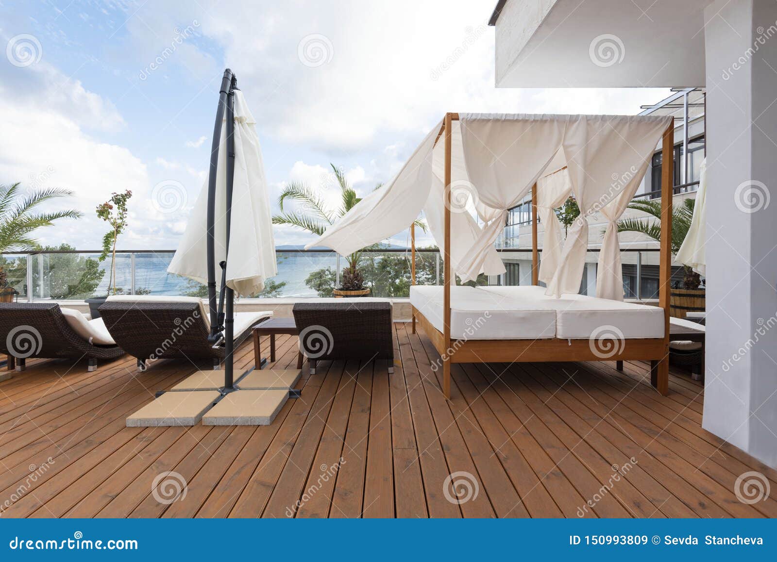 Swimming Pool Area with White Sun Beds. Summer Vacation Stock Image ...