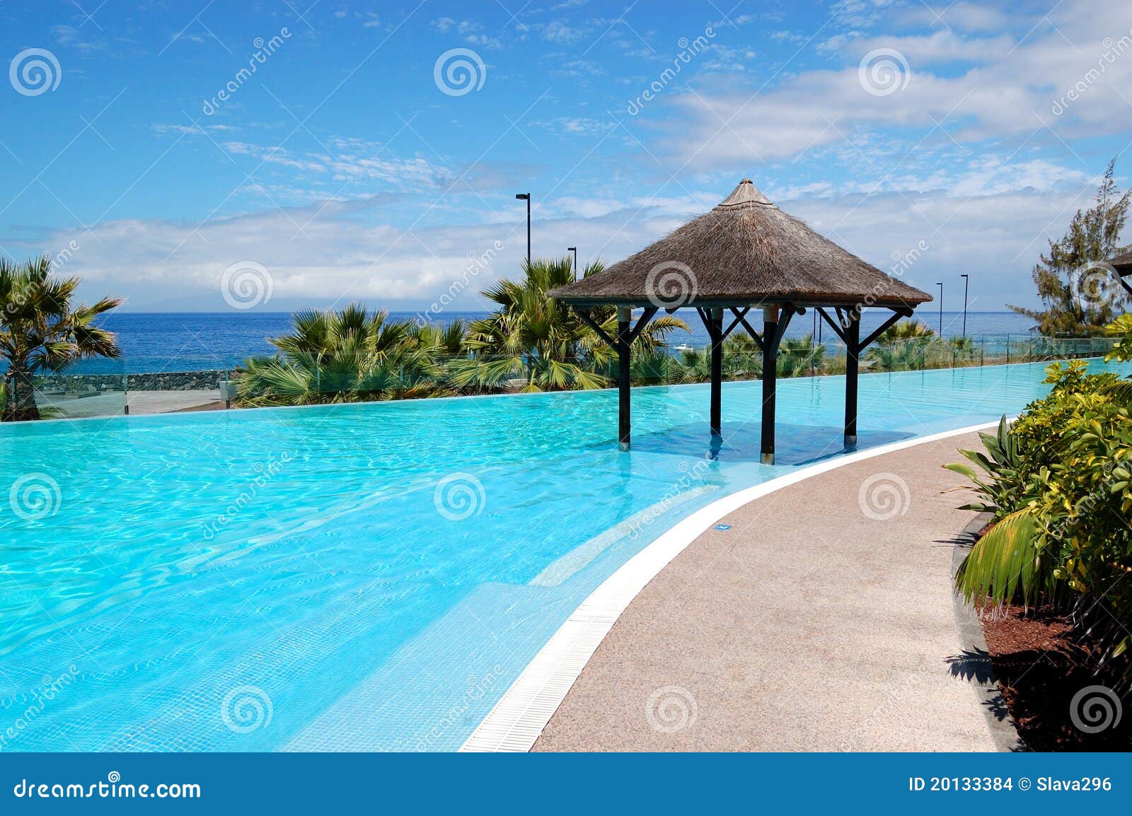 Swimming Pool with Bali Type Hut and Beach Stock Photo - Image of ocean ...