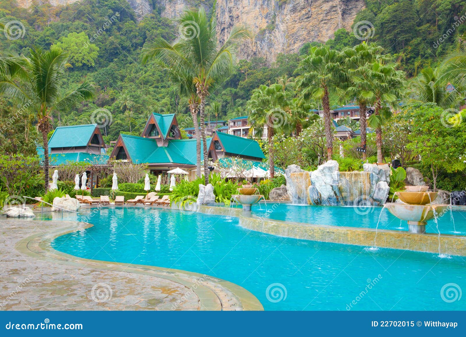 Swimming pool on the beach stock image. Image of resort - 22702015