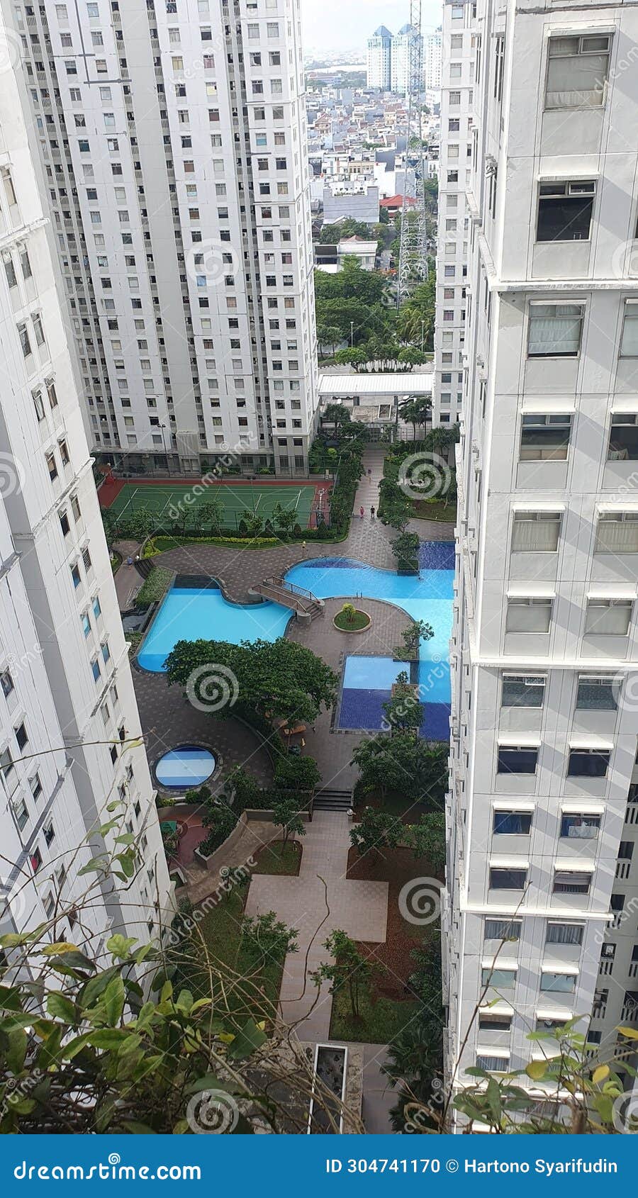 Swimming Pool between Buildings in Indonesia Stock Photo - Image of ...