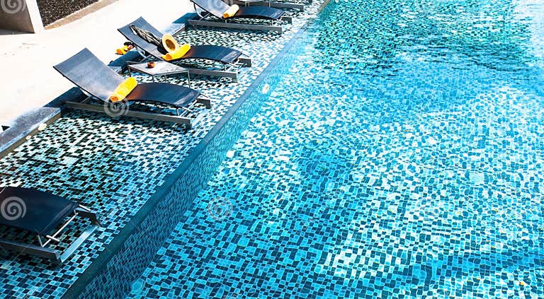 Swimming pool and Couch stock image. Image of beauty - 30060673