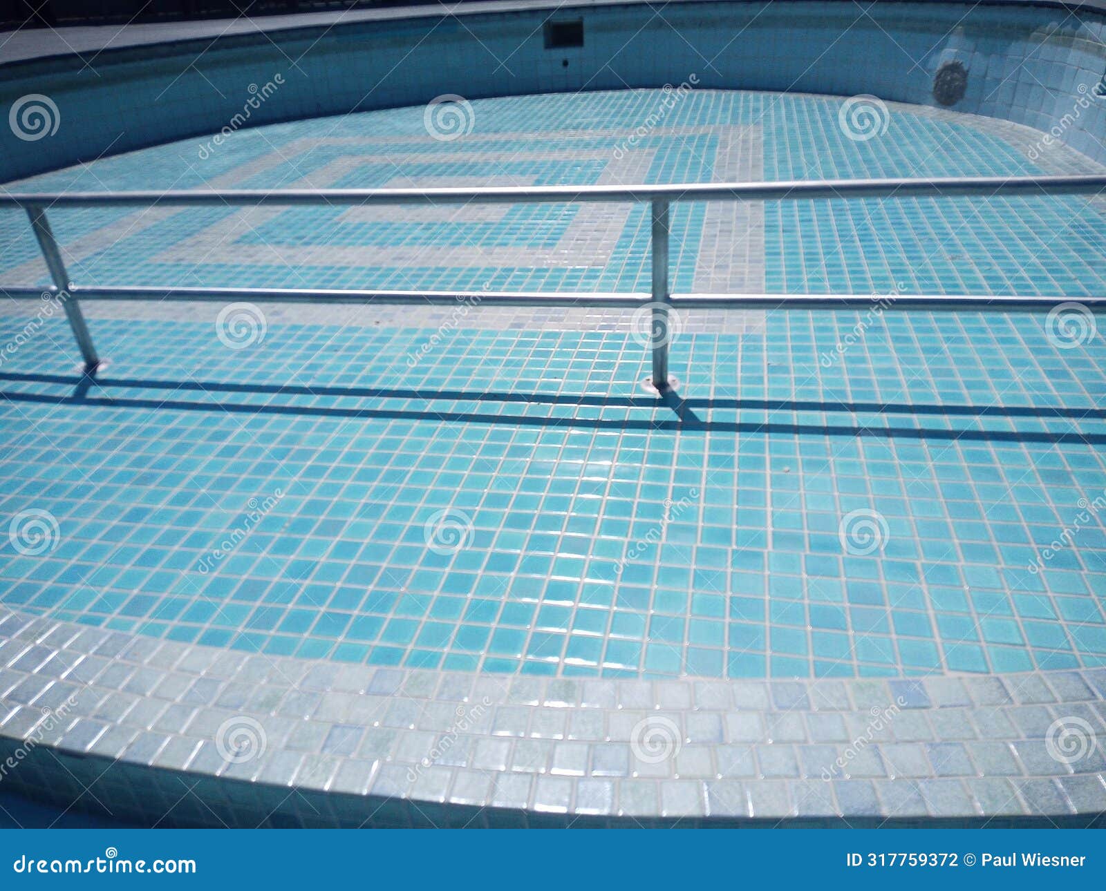 Swimming Pool Empty Due To Renovation Being Tiled in the Back of a ...