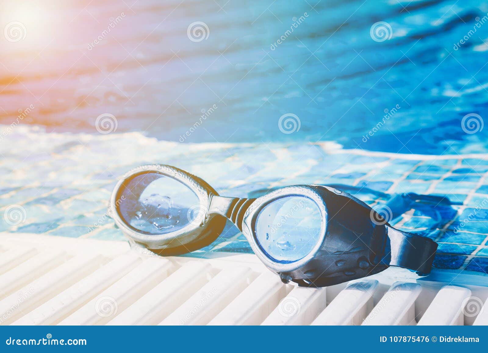 Swimming Pool Goggles On The Poolside Stock Photo - Image of accessory ...