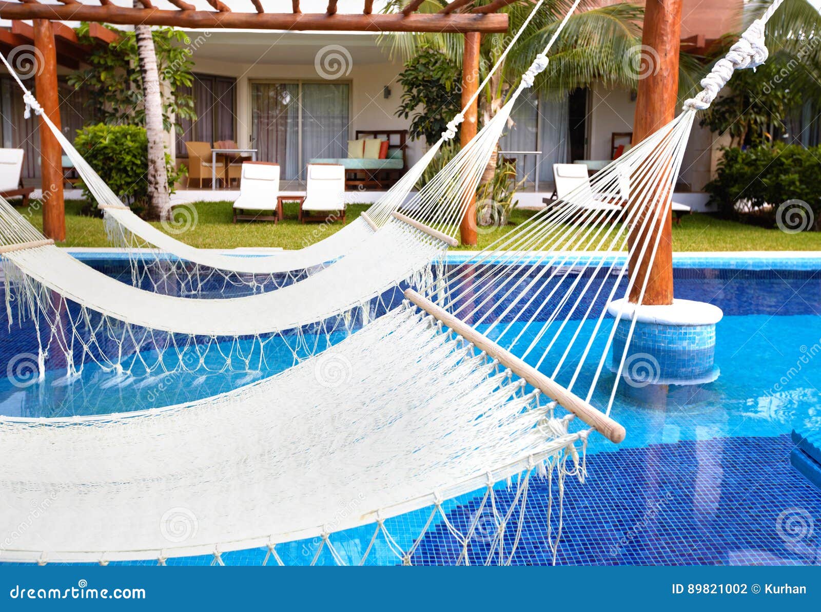Swimming pool and hammock. stock photo. Image of relax - 89821002