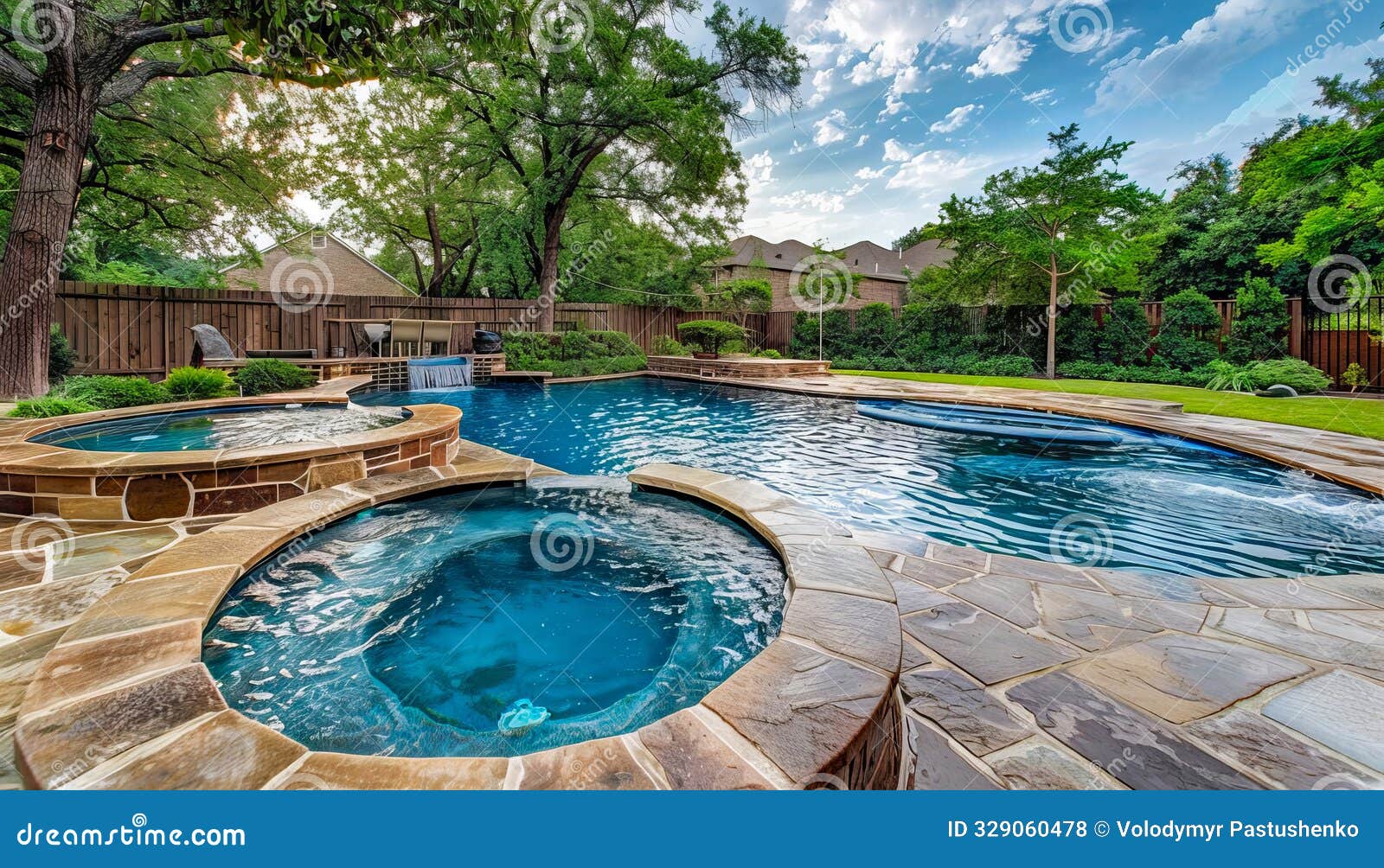 A Swimming Pool with a Hot Tub in the Middle of it Stock Photo - Image ...