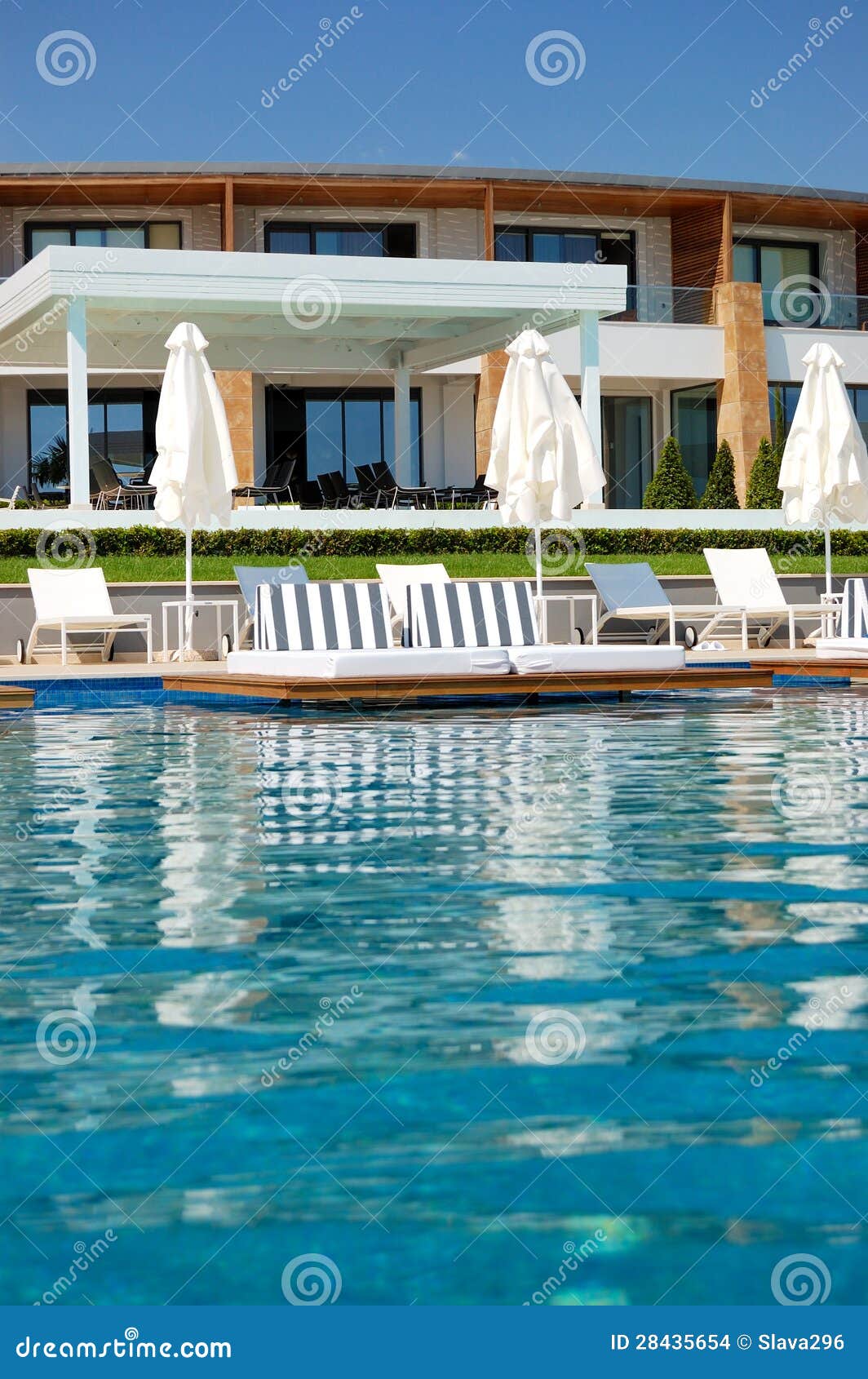 Swimming Pool with Jacuzzi by Beach at the Modern Luxury Hotel Stock ...