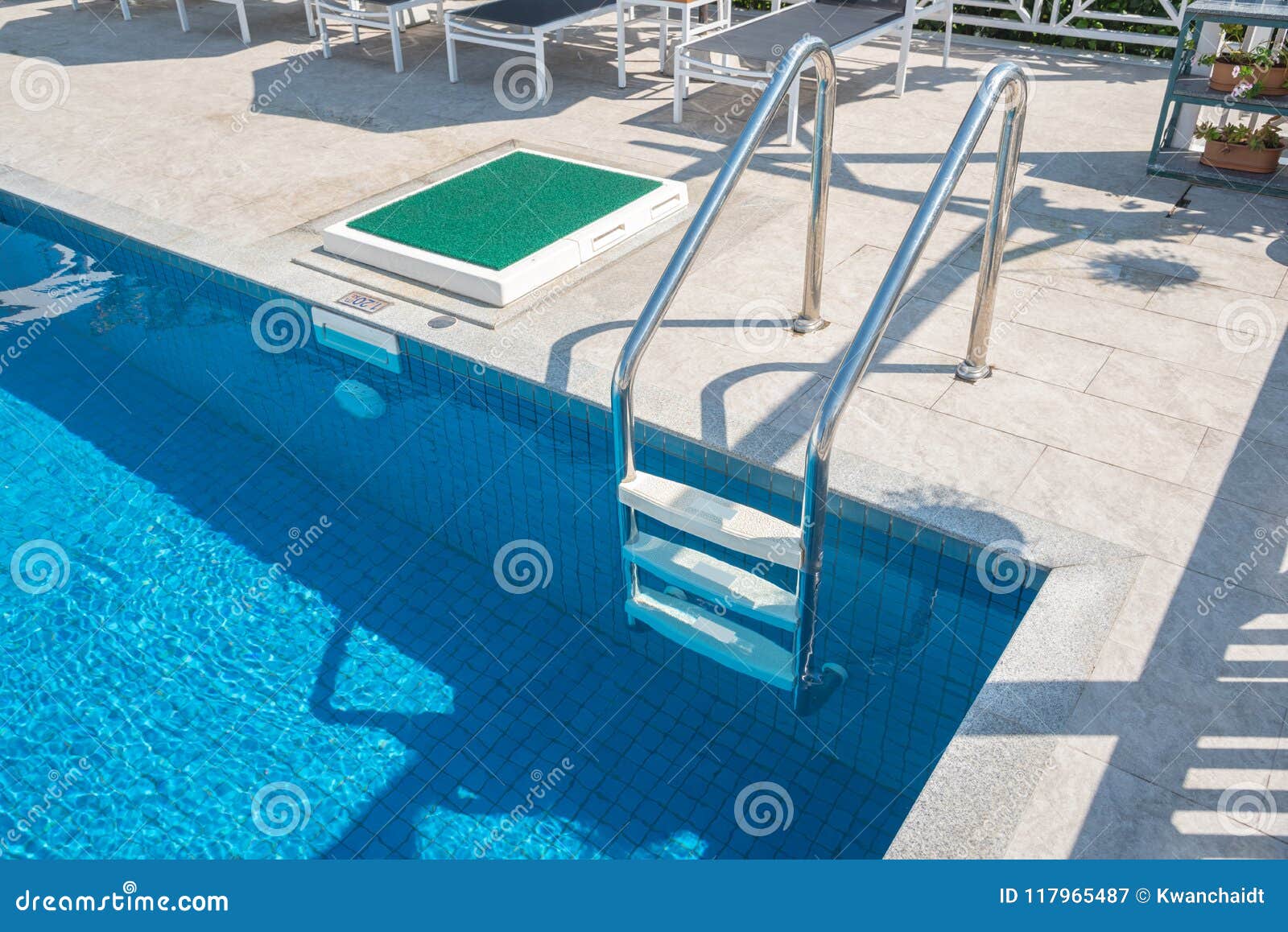 Swimming pool ladder stock image. Image of sunlight - 117965487