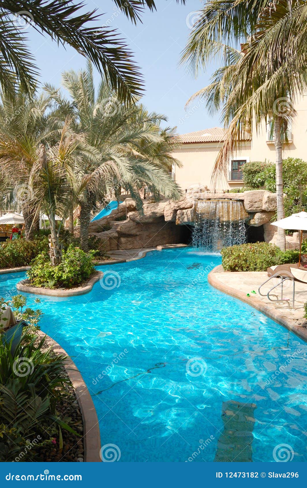 Swimming Pool at Luxury Hotel Stock Photo - Image of palm, chair: 12473182