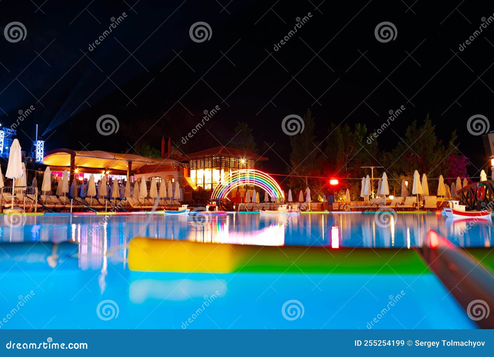 Swimming Pool at a Luxury Resort at Night Time Stock Image - Image of ...