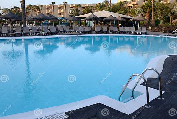 Swimming Pool in Morning Light Stock Photo - Image of luxurious, side ...