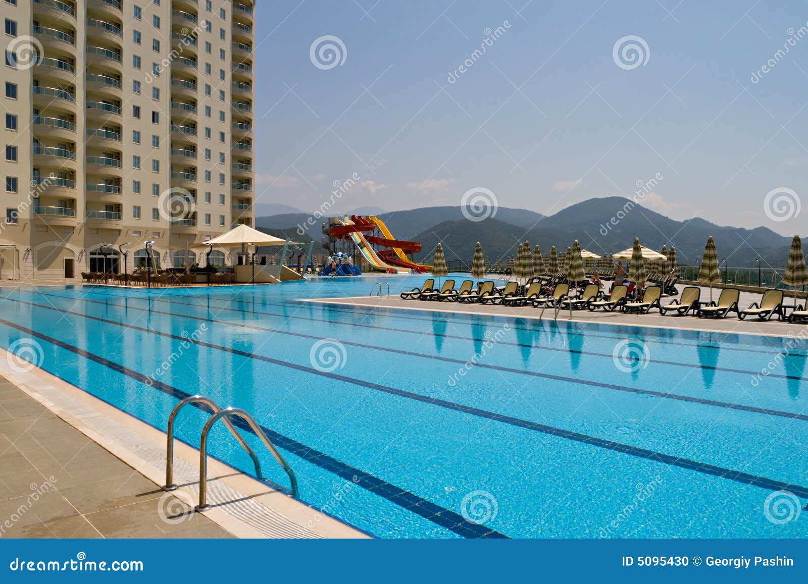 Swimming pool near hotel stock photo. Image of leisure - 5095430