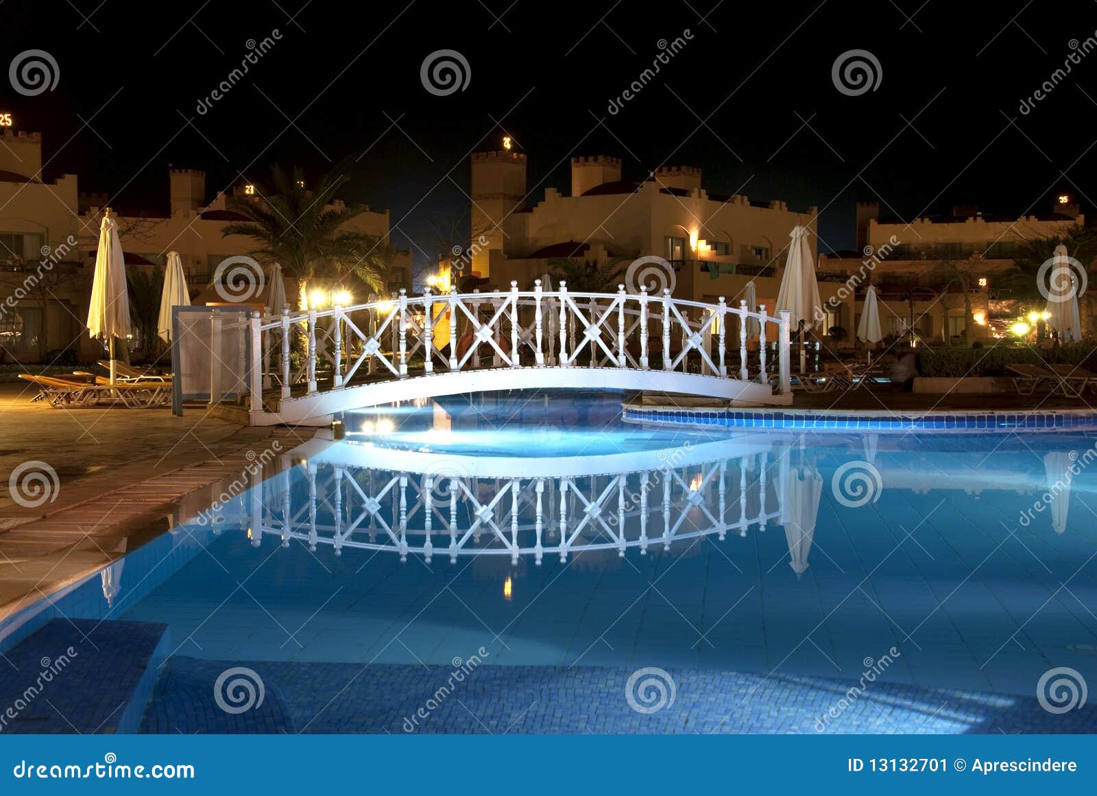 Swimming pool by night stock image. Image of holiday - 13132701