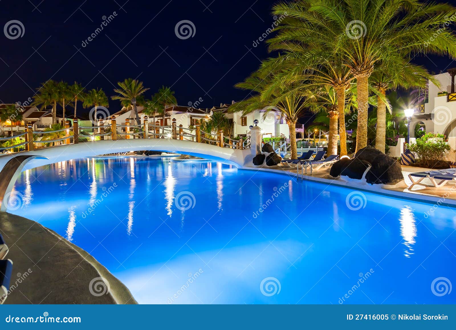 Swimming pool at night stock image. Image of island, attraction - 27416005