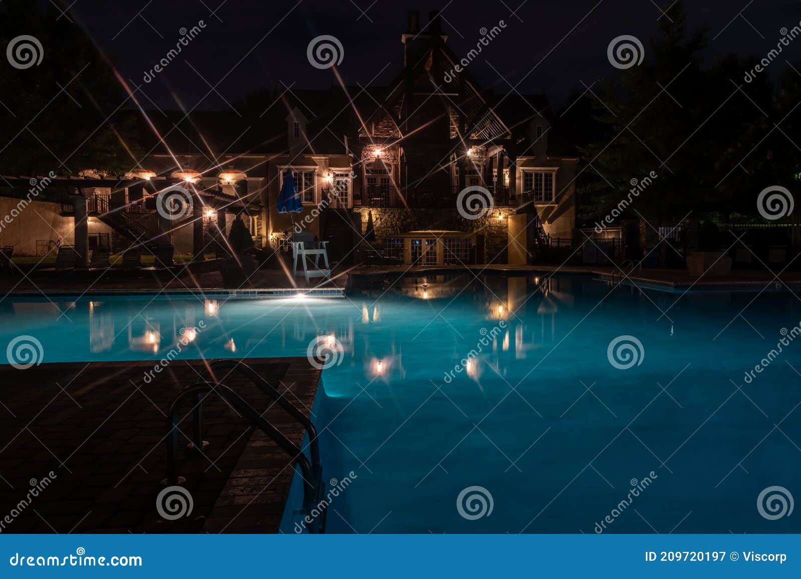 Swimming Pool at Night stock image. Image of curved - 209720197