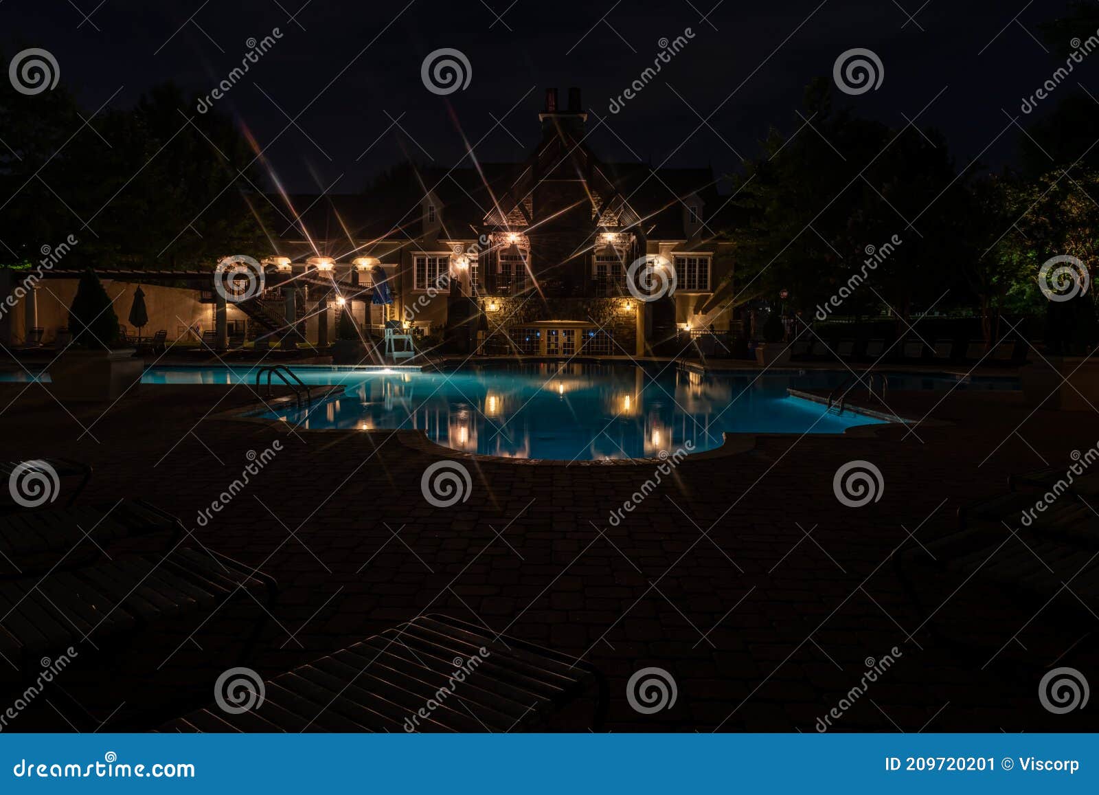 Swimming Pool at Night stock image. Image of clouds - 209720201